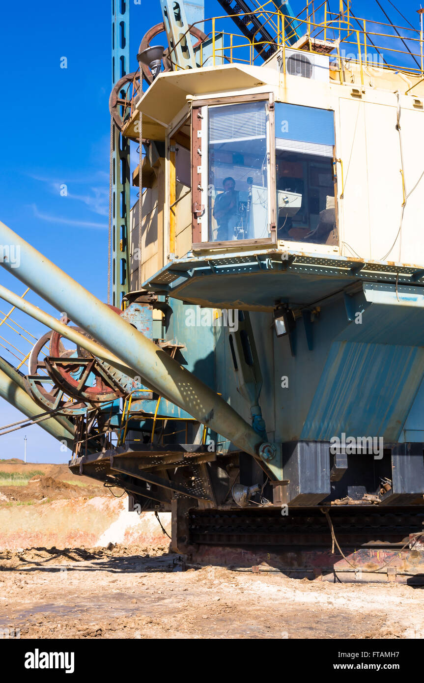 the cabin huge boom clay mining excavator, view up Stock Photo - Alamy