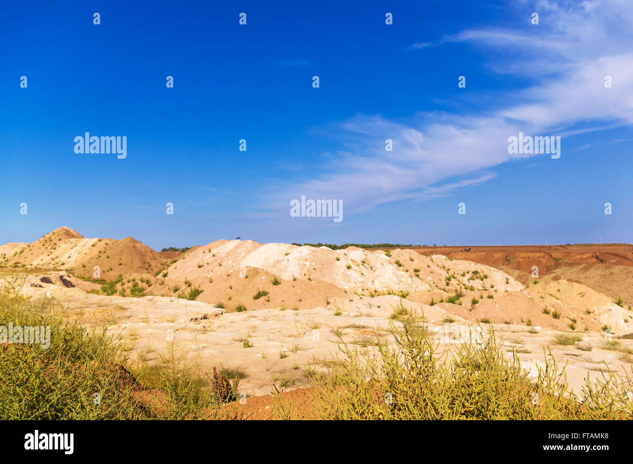 the quarry of the unique blue clay in bright summer day Stock Photo - Alamy