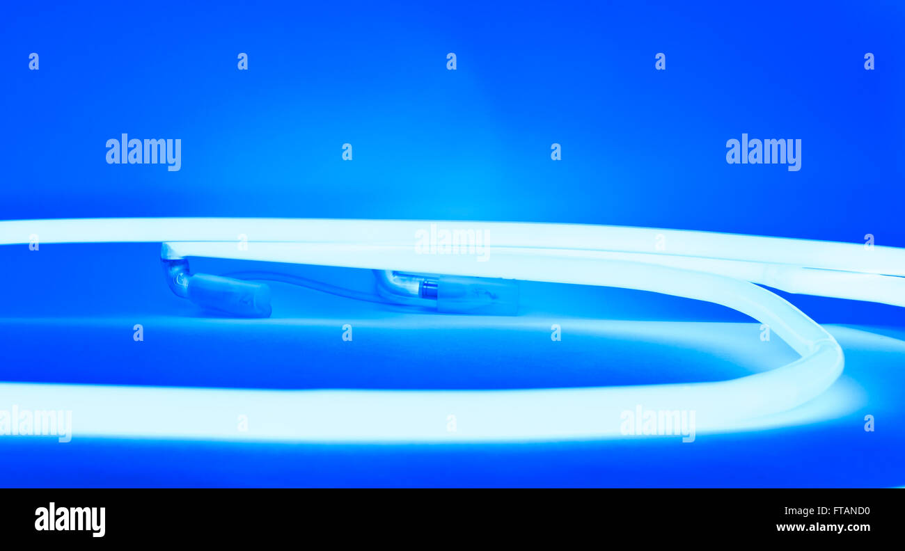 Neon blue light backdrop Stock Photo - Alamy