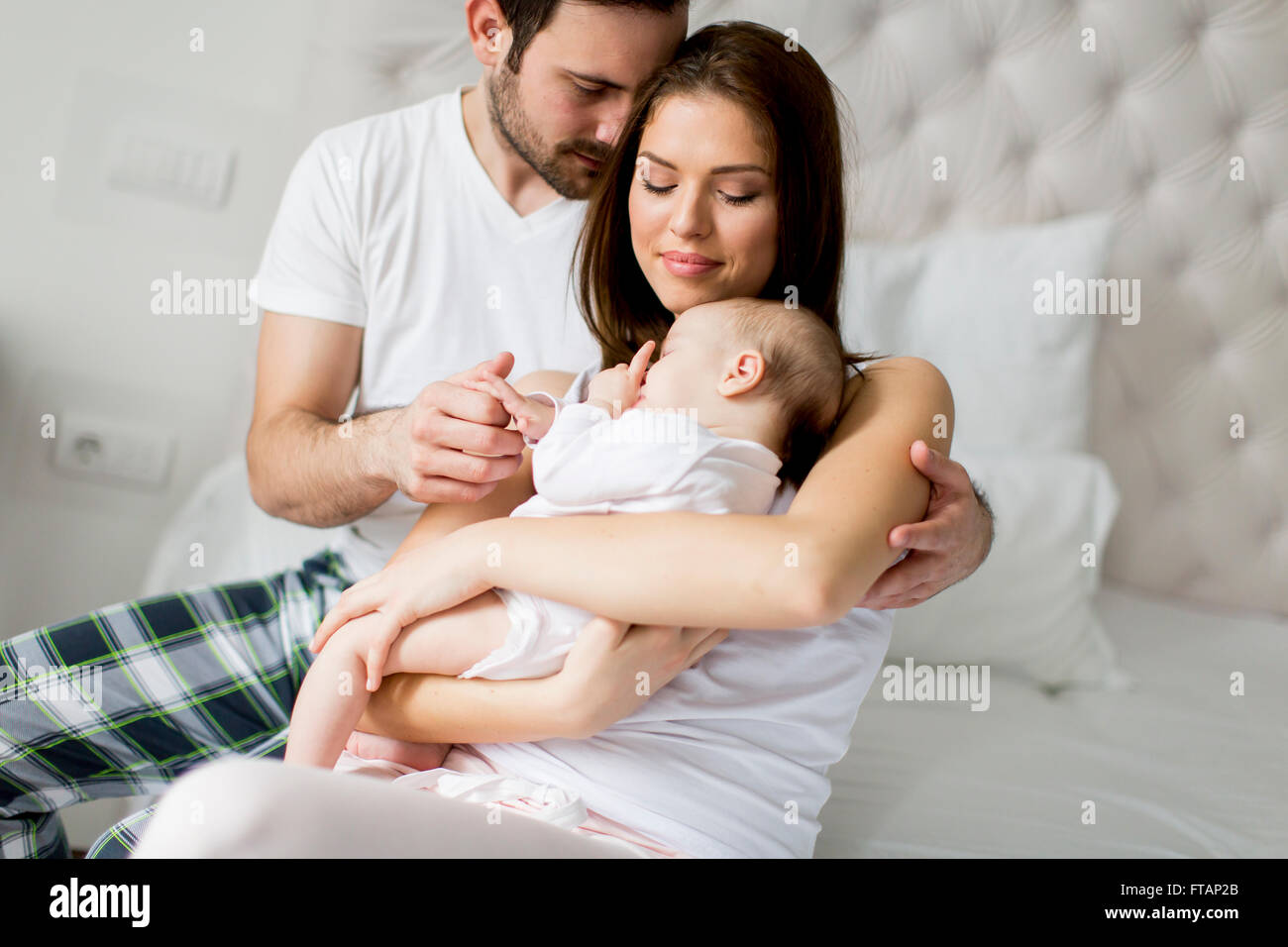 Happy couple cute baby hi-res stock photography and images - Alamy