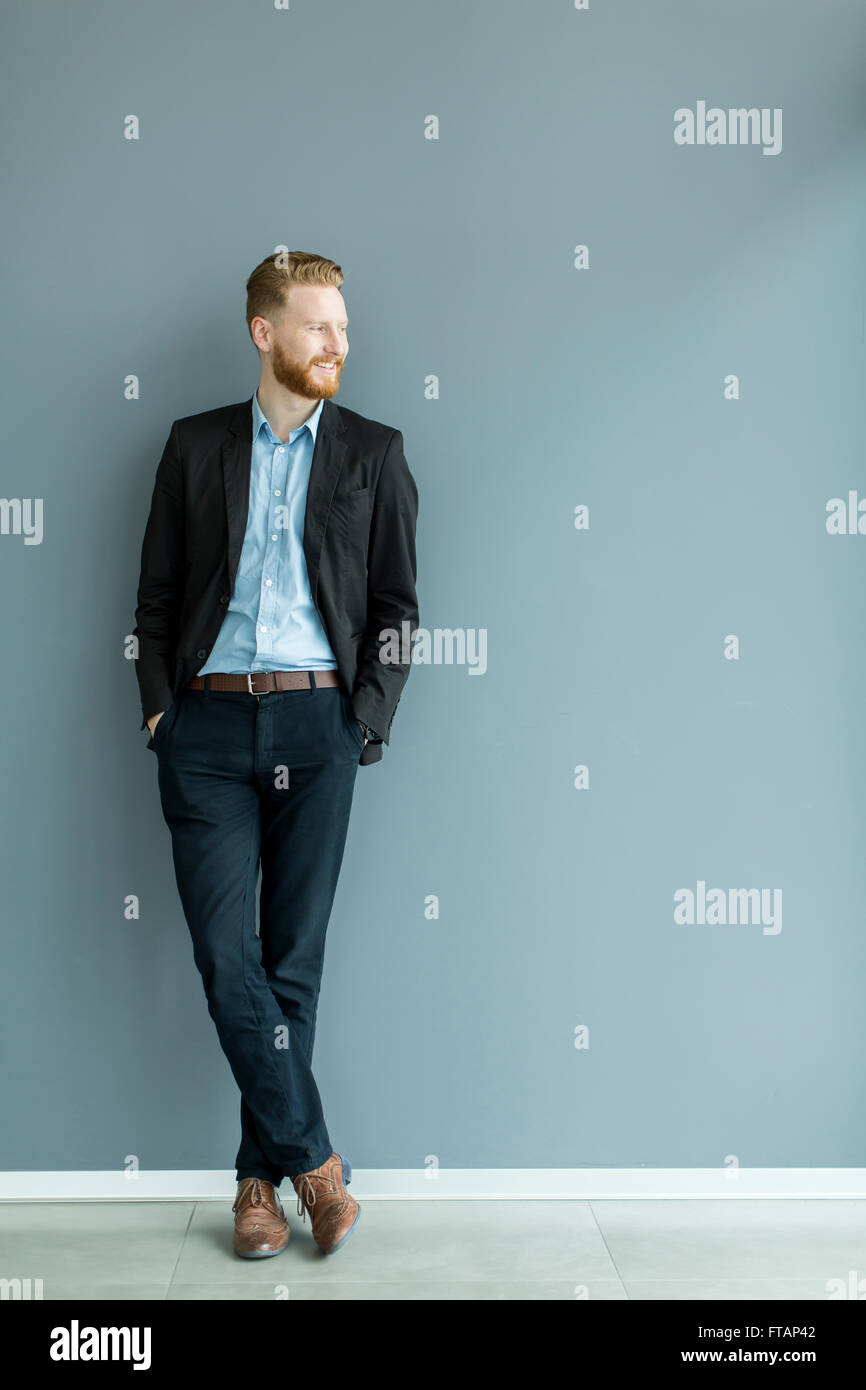 View of the businessman posing in the office Stock Photo - Alamy
