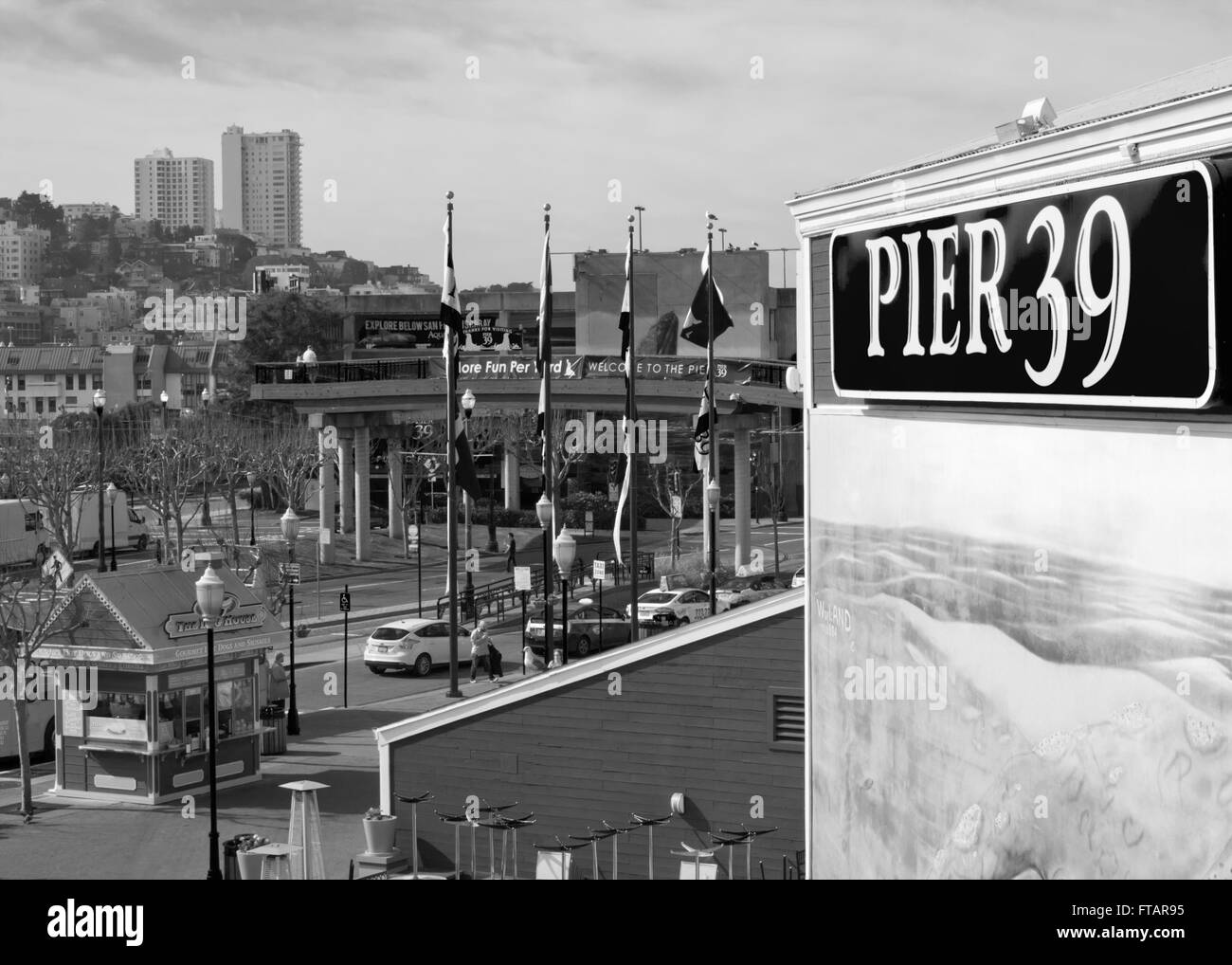 Pier 39 sign in San Francisco, California, with the city skyline and ...