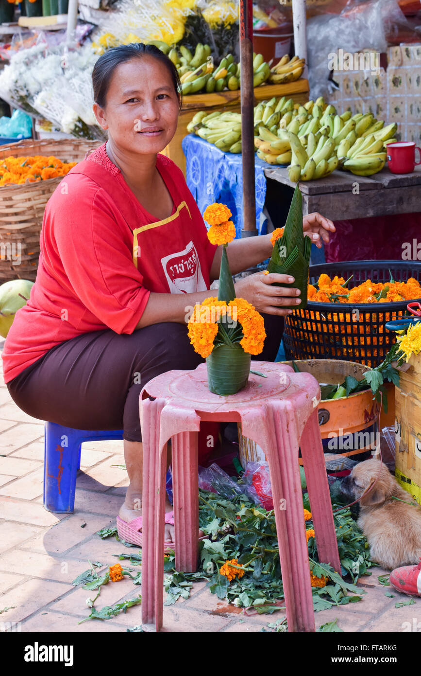 Saleslady Stall selling flowers for Buddhist celebrations downtown ...