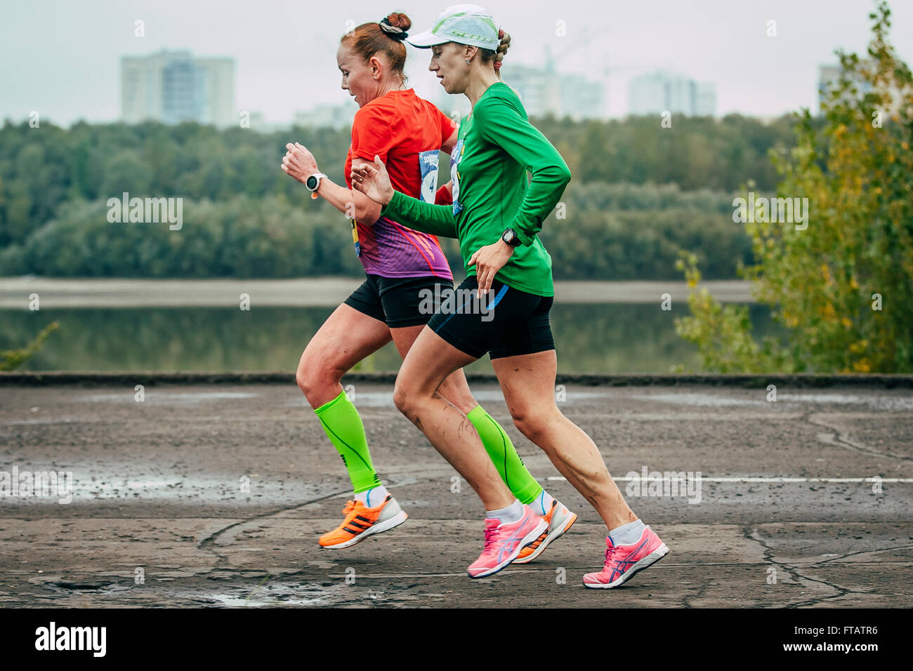 Omsk, Russia - September 20, 2015: competition two girls athletes ...