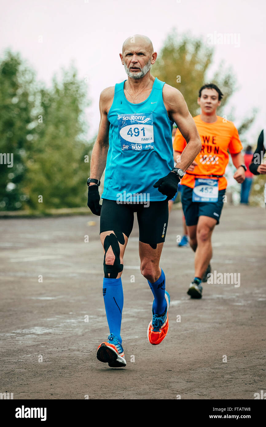 Kinesio taping older hi-res stock photography and images - Alamy