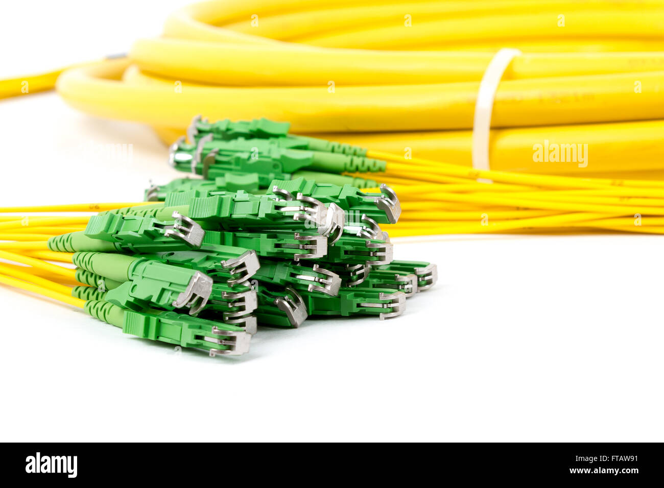 fiber optic E2 (LSH) pigtail, patchcord connectors on white background ...