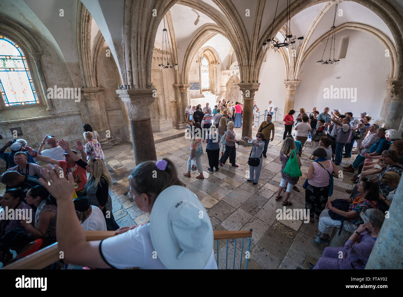 Pilgrims praying in Cenacle - Upper Room, held to be a site of The Last ...