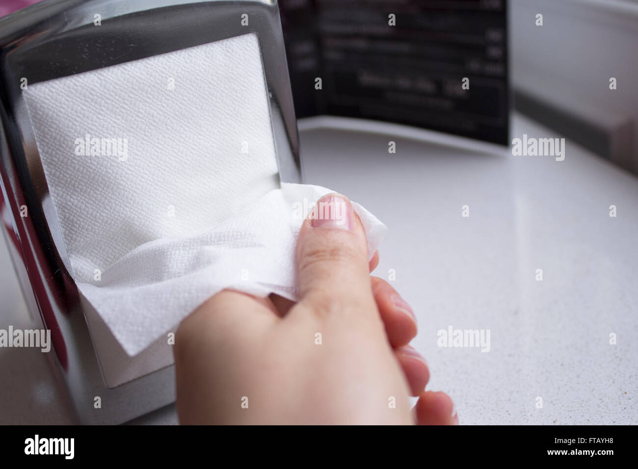 Woman hand taking a napkin Stock Photo - Alamy