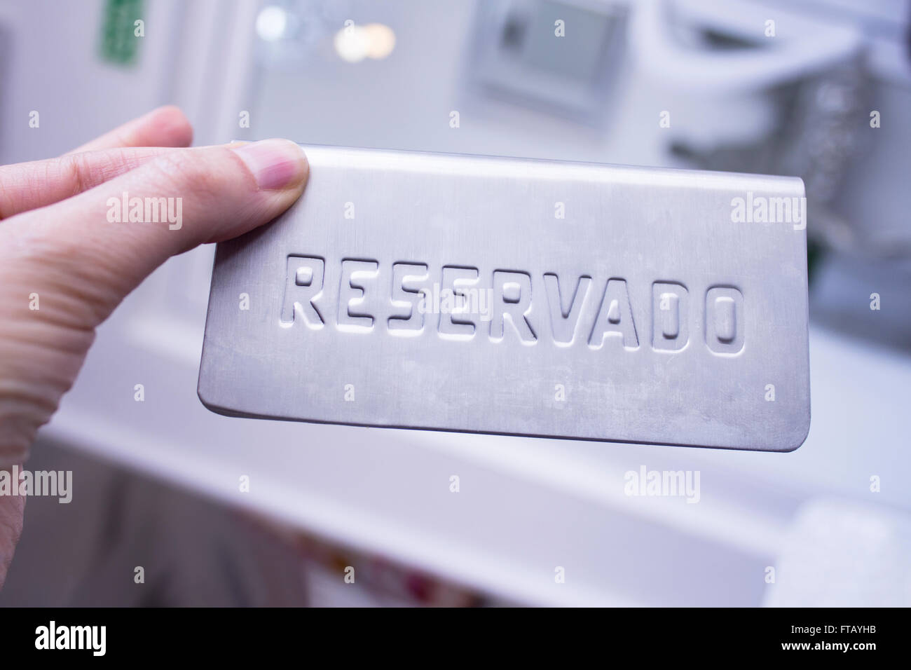 Poster reserved in Spanish Stock Photo - Alamy