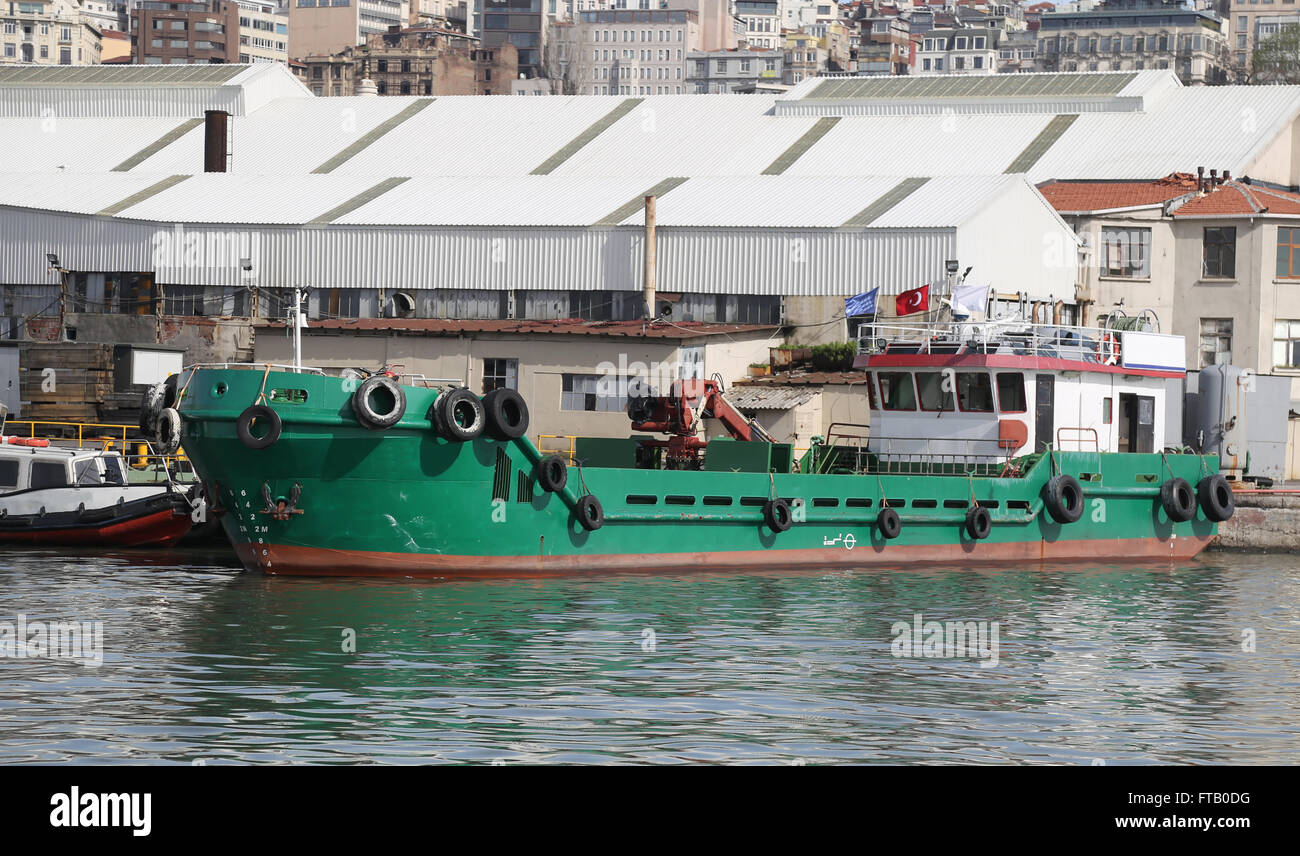 A Green Cargo Ship in a Shipyard Stock Photo - Alamy