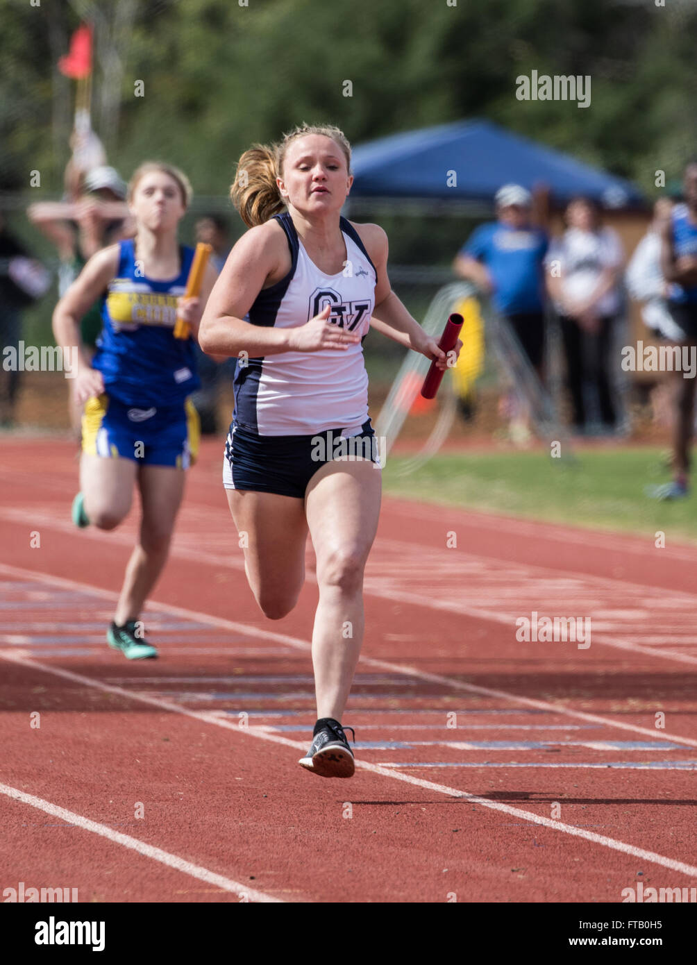 Woman track relay hi-res stock photography and images - Alamy
