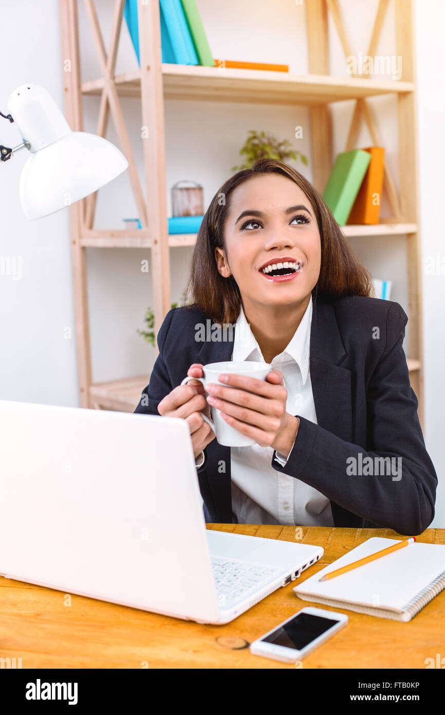 Nice photo of business woman in office Stock Photo - Alamy