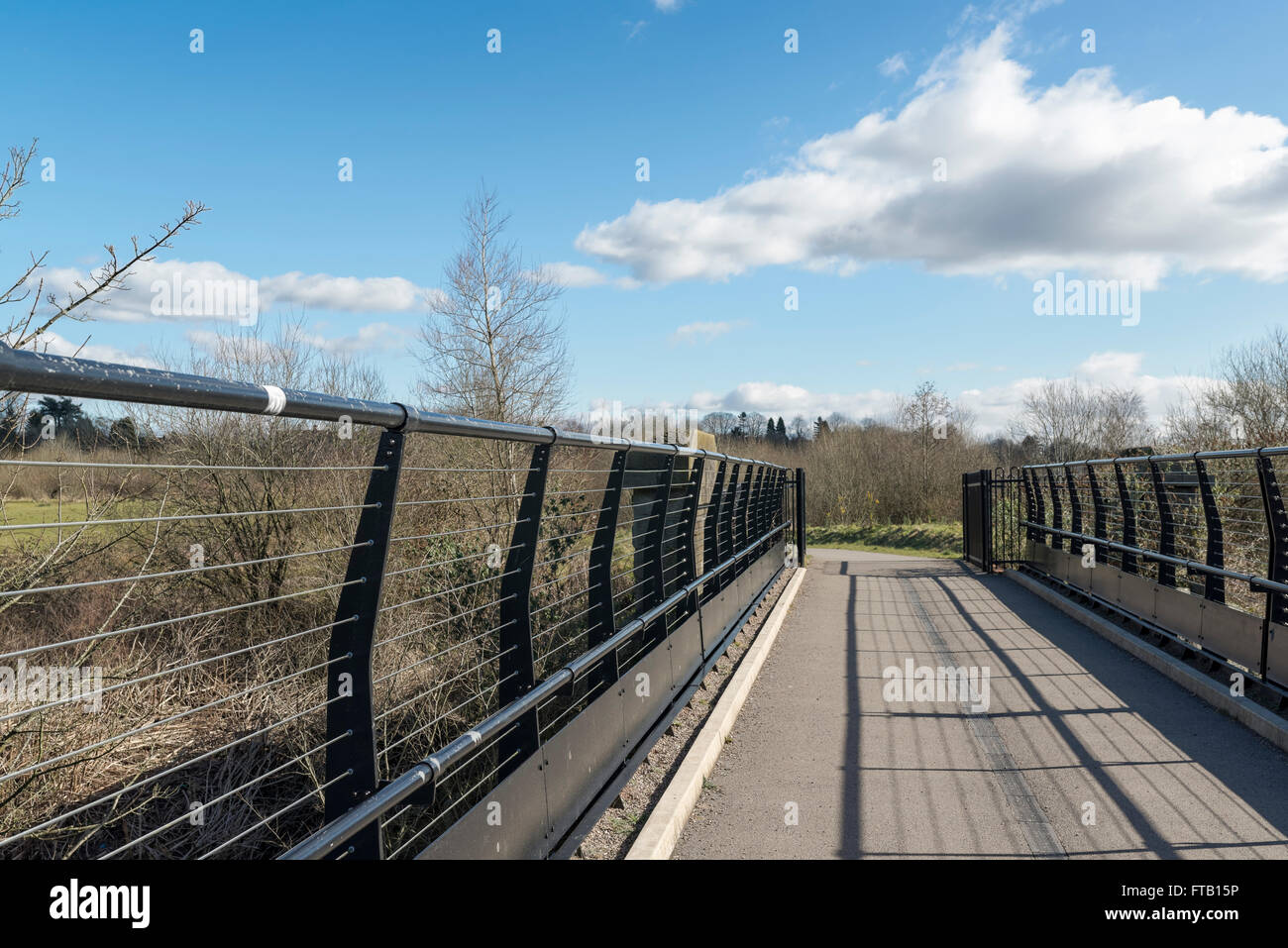 Footbridge across the River Taff. Formally a railway bridge Stock Photo ...