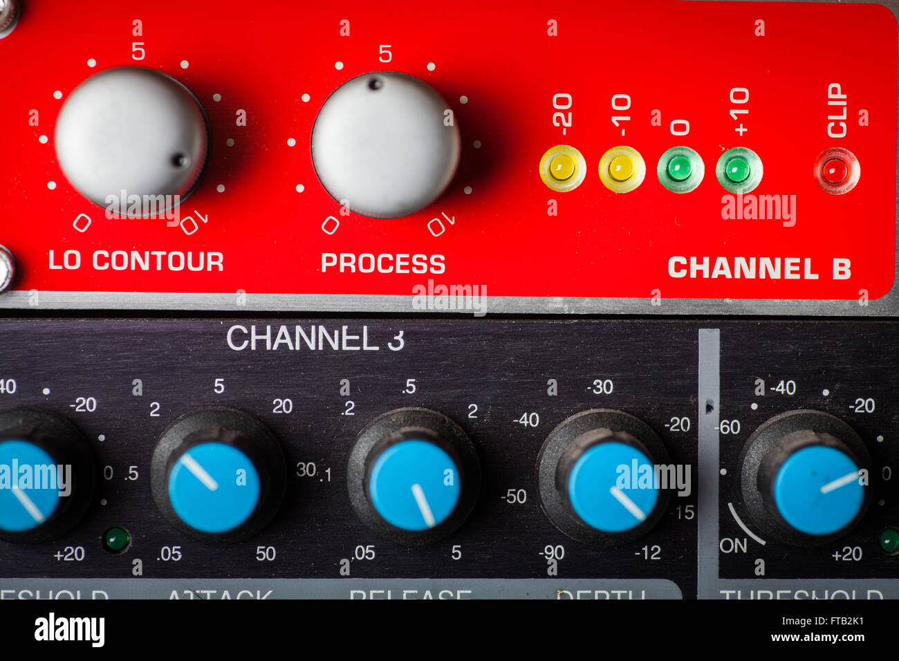 Color image of many buttons on a sound mixer in a recording studio ...