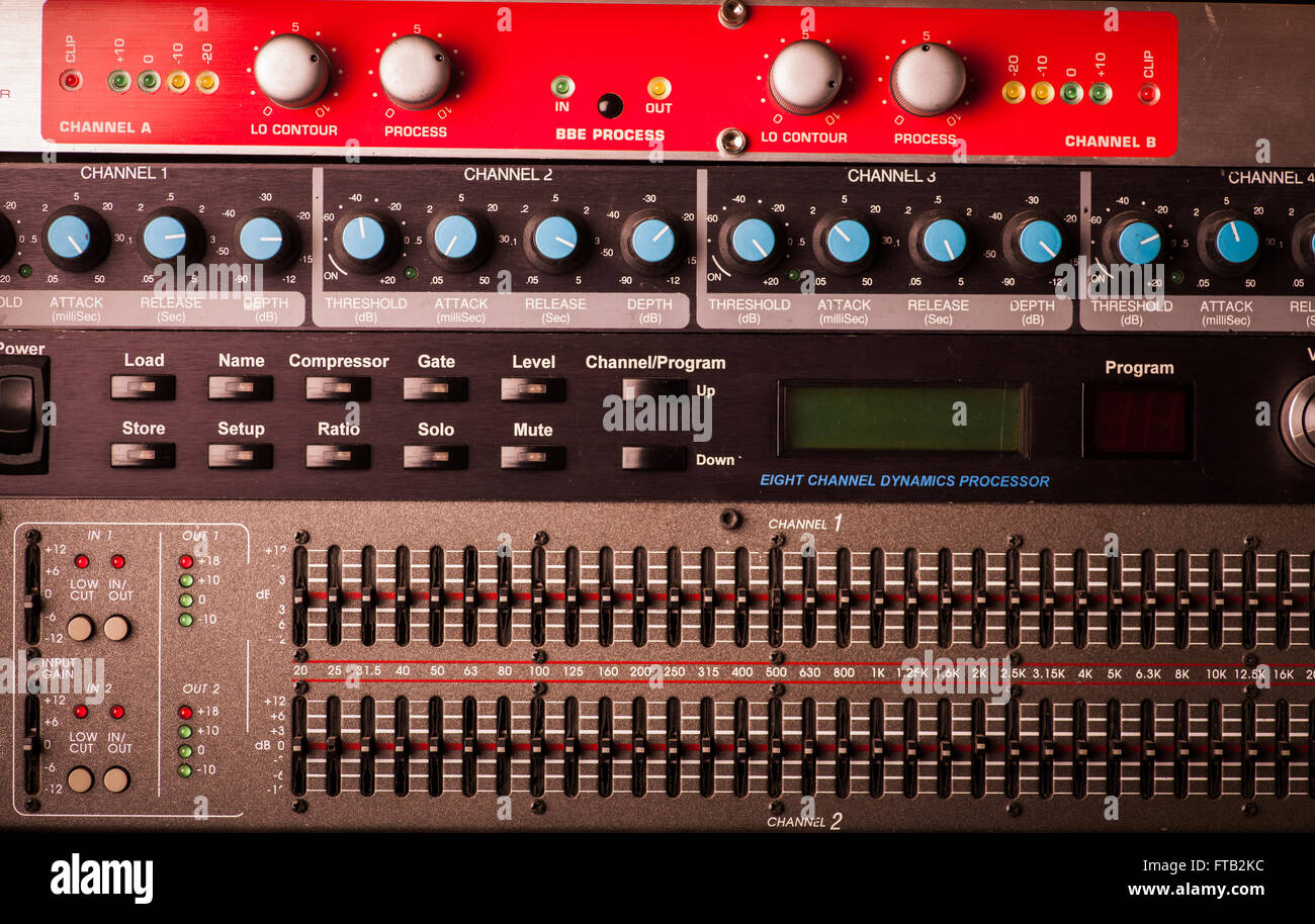 Color image of many buttons on a sound mixer in a recording studio ...