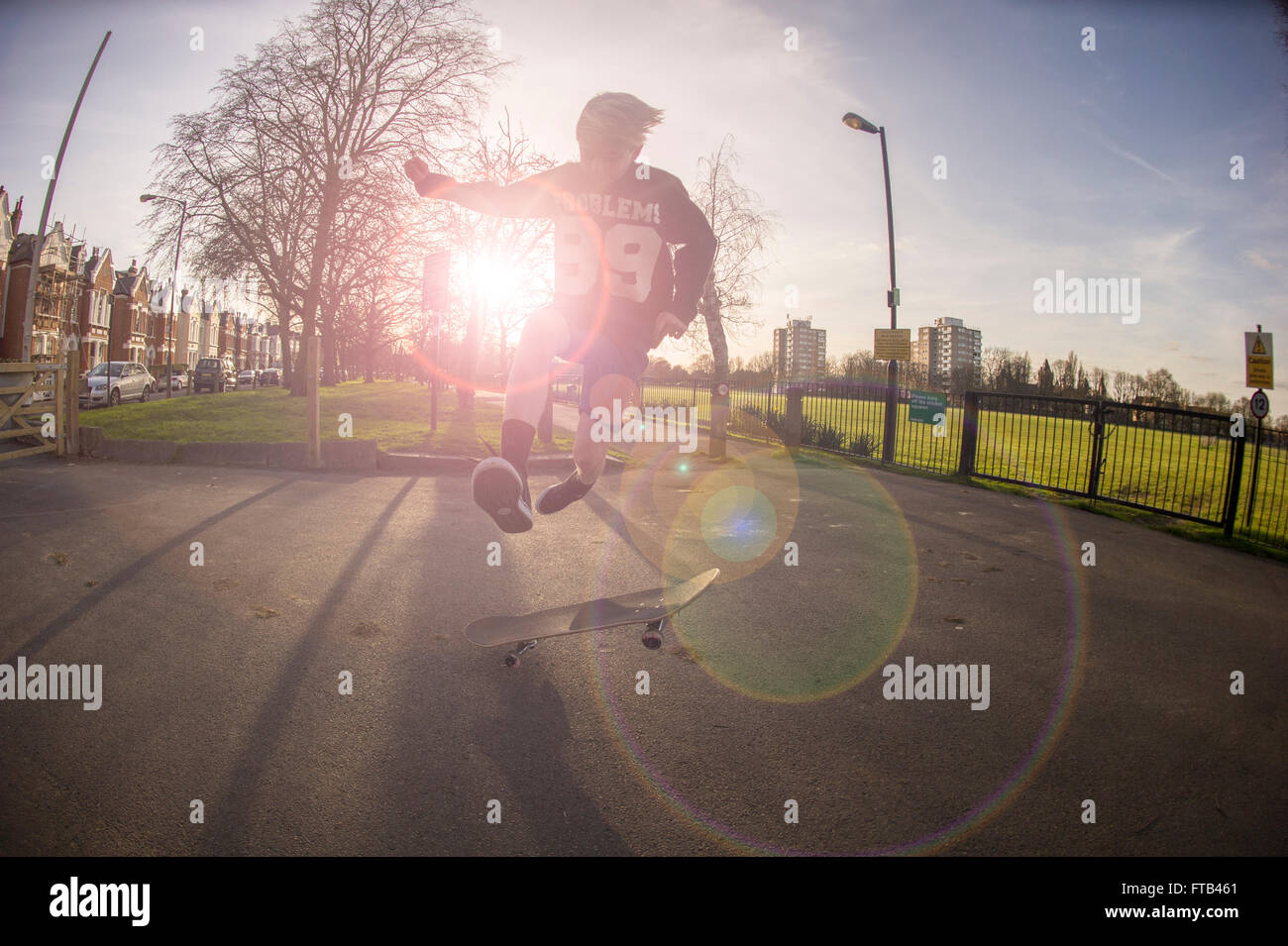 Skateboarding on a sunny spring day in a London park Stock Photo - Alamy