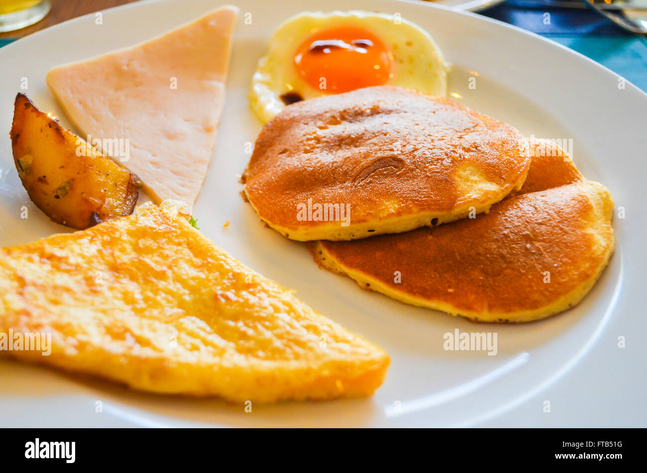 American breakfast : Ham , potato,pancake fried toast and fried-egg ...