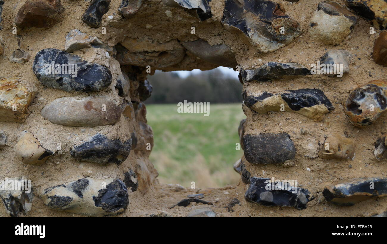 Close up of stone lookout at the archaeological ruins of Tilty Abbey ...
