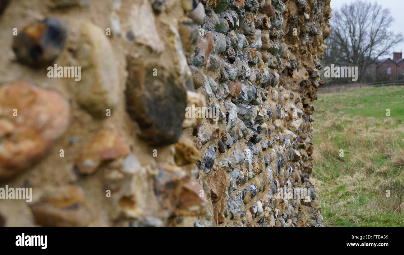 The wall at the archaeological ruins of Tilty Abbey near Stansted ...