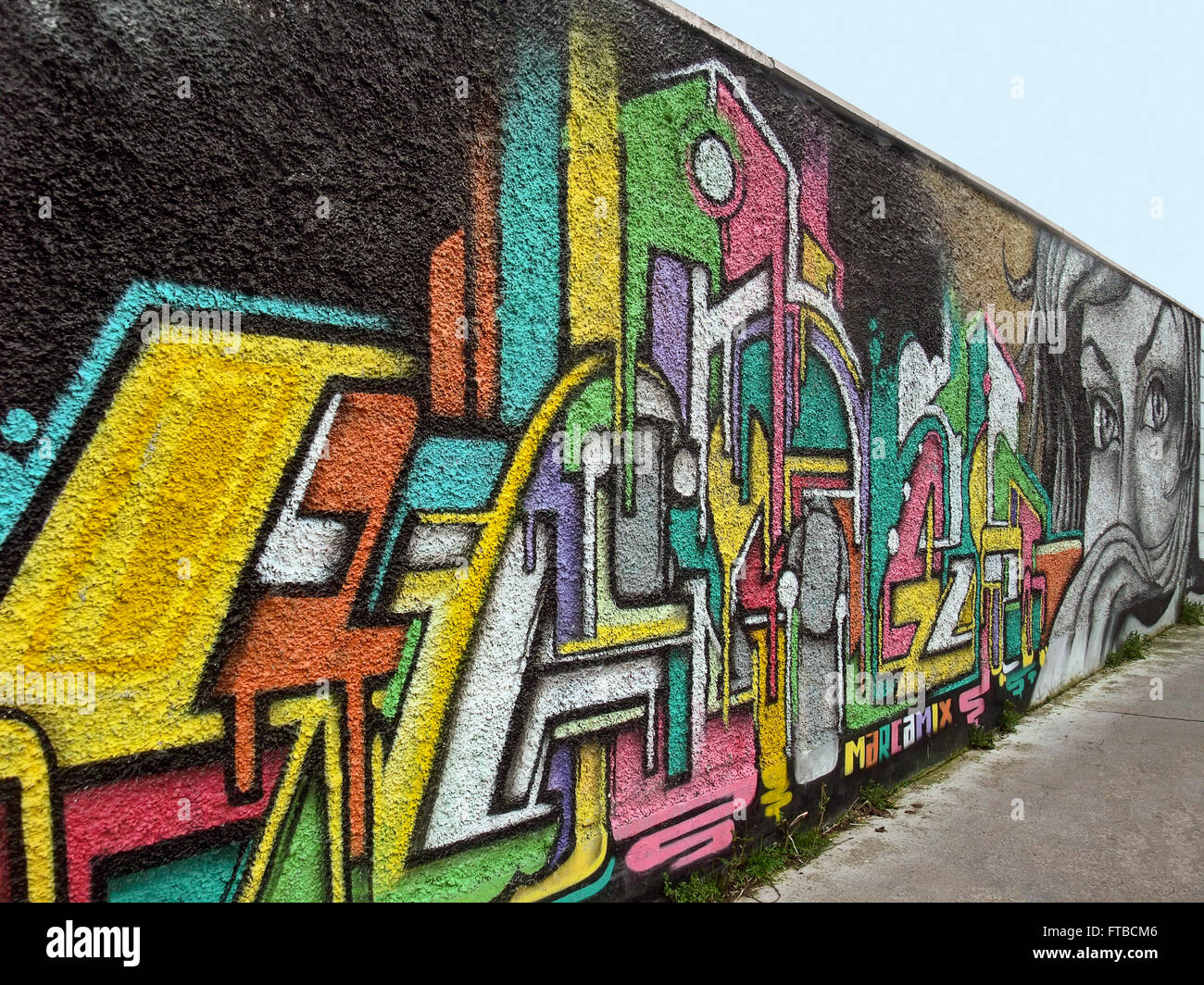 wall with painted graffiti on it seen in Dublin, Ireland Stock Photo ...