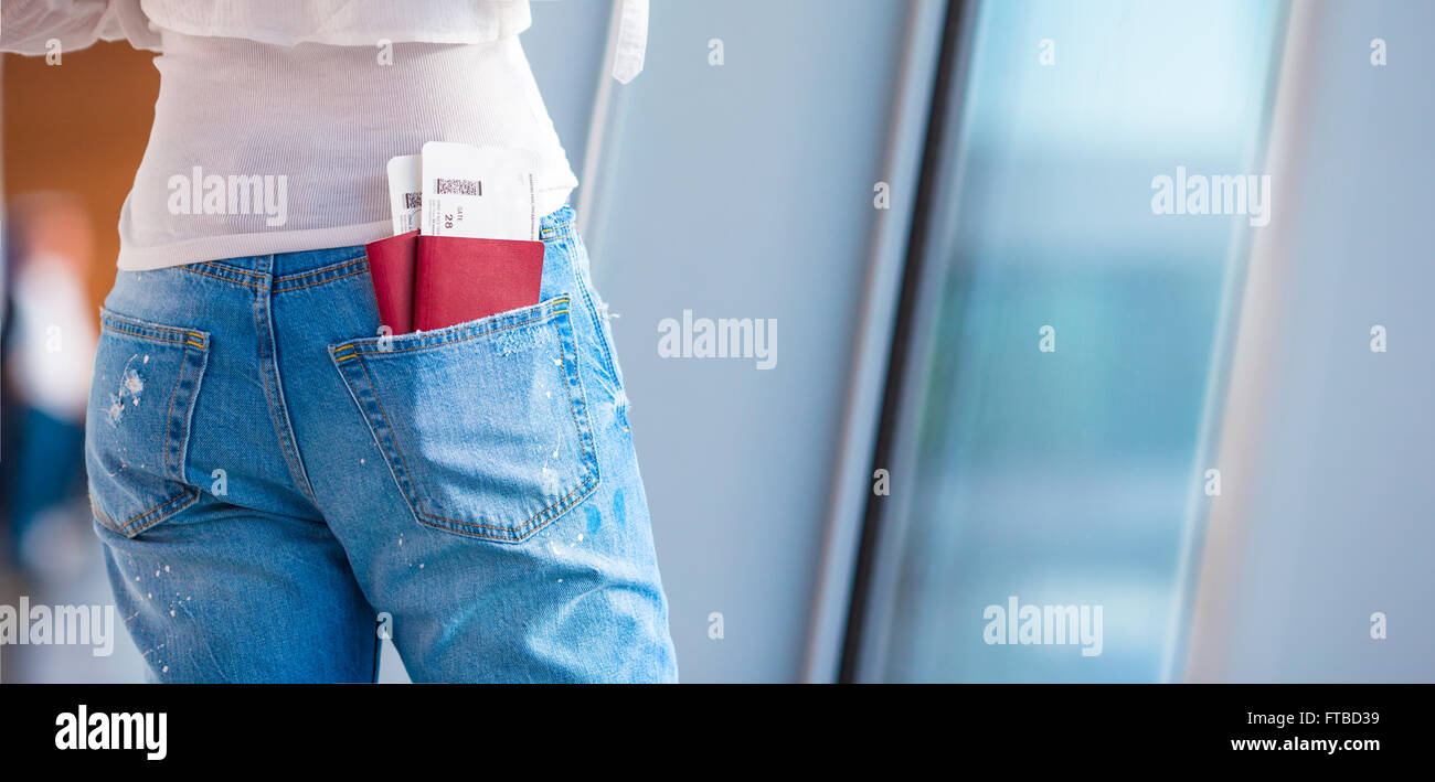 Woman giving boarding pass hi-res stock photography and images - Alamy