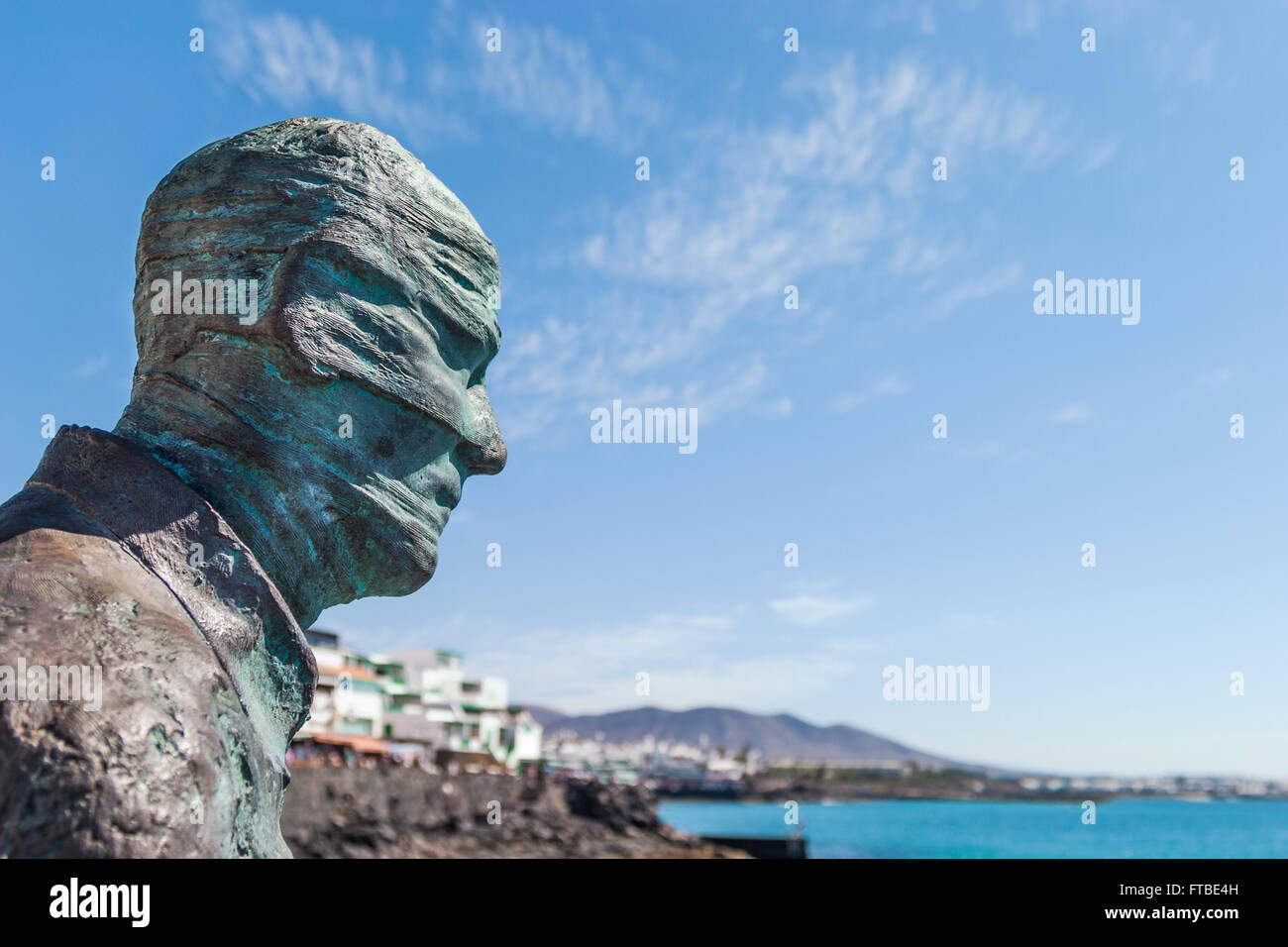 Statue dedicated to the previous generations of Canarians. Playa Blanca ...