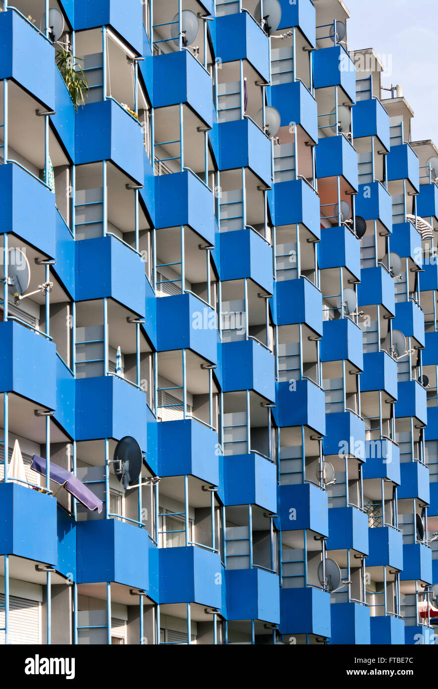 Apartment house with blue balconies Stock Photo - Alamy