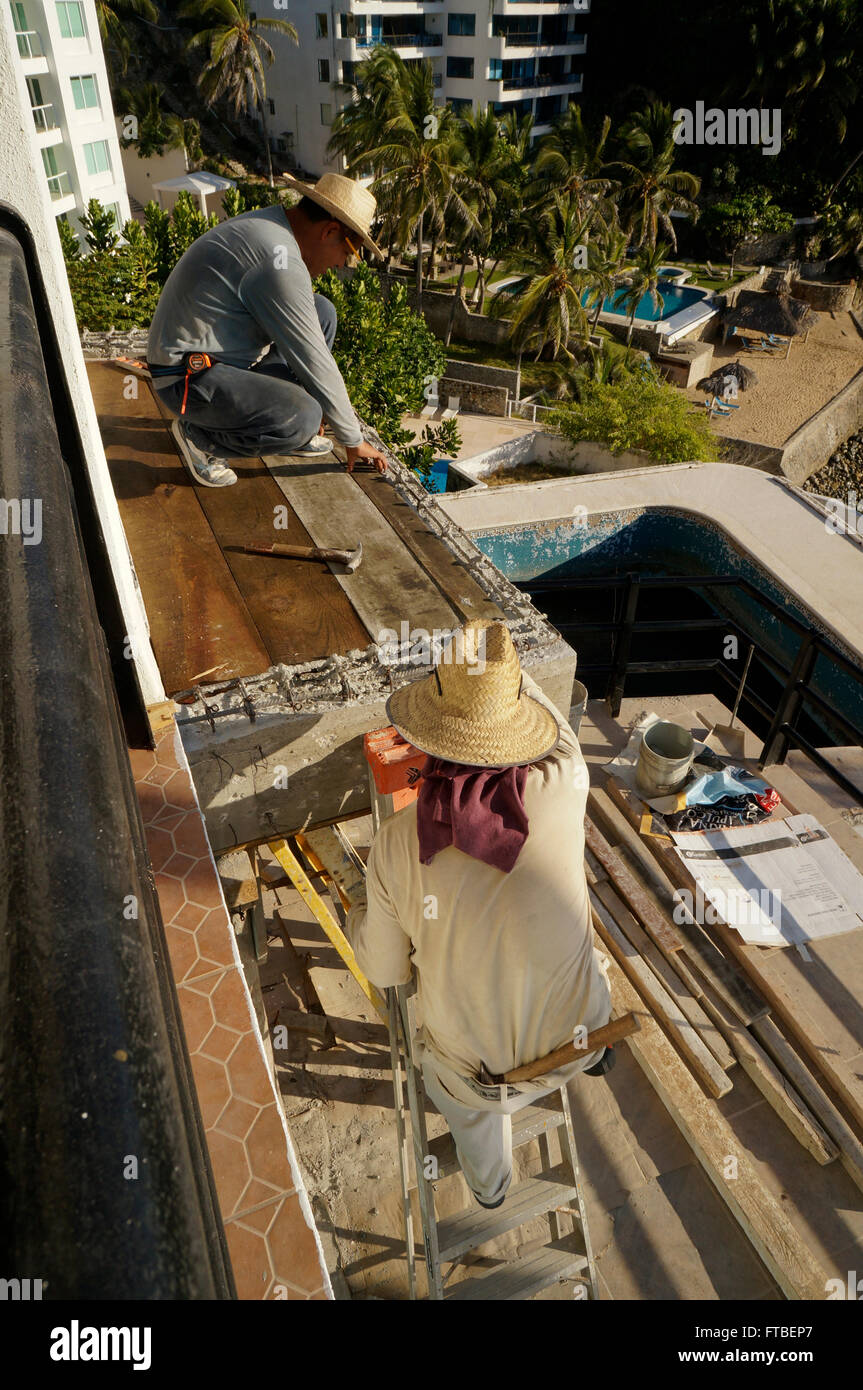 Mexican men building small terrace on home in Acapulco, Mexico Stock ...