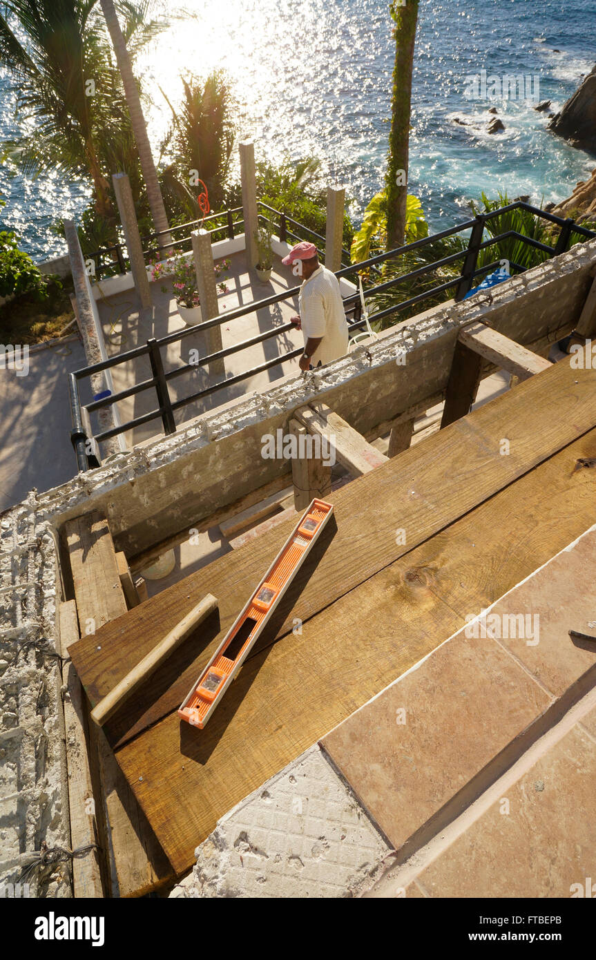 Contractor's level on new terrace under construction in Acapulco ...