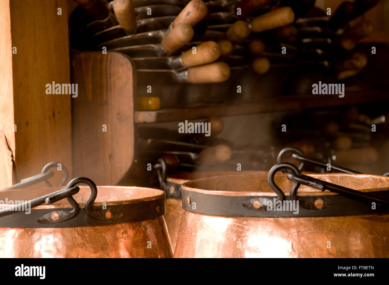 Copper cookers with steaming food inside Stock Photo - Alamy