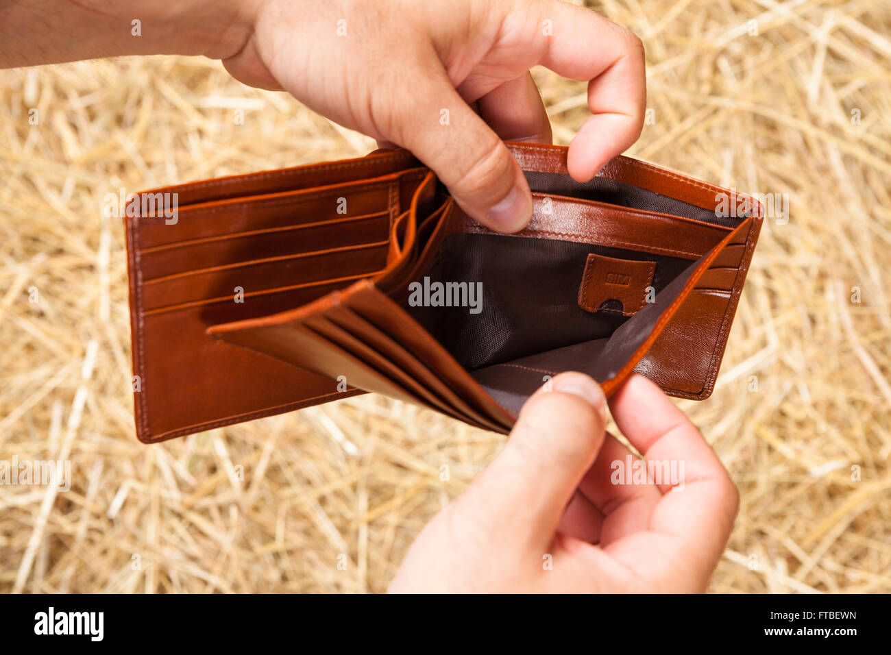Male white hands open wallet hi-res stock photography and images - Alamy