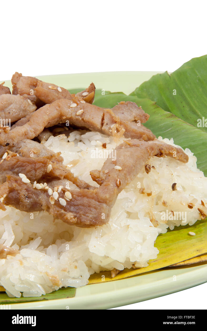 stick rice with pork wrapped in banana leaves. traditional and street ...
