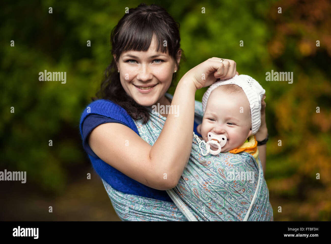 Mama with a baby Stock Photo - Alamy