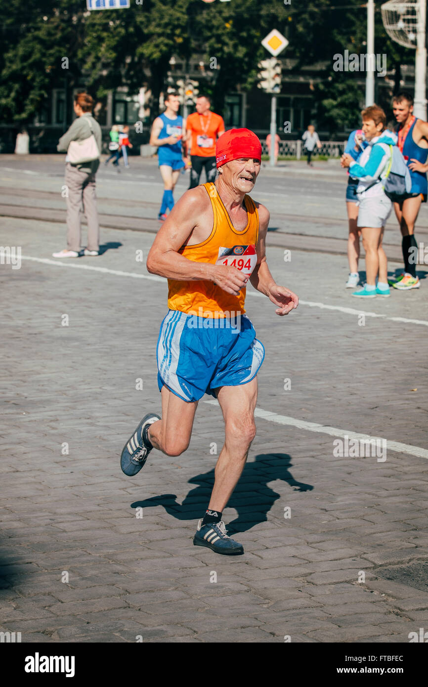 Ekaterinburg, Russia - August 01, 2015: old man runner competes during ...