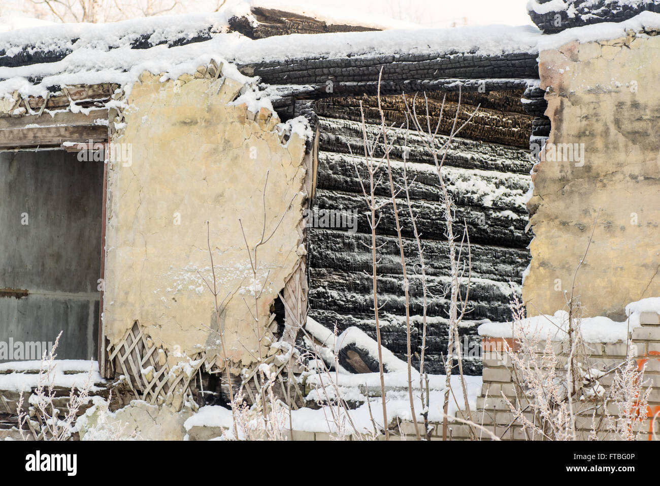 house snow building old winter destruction burned Stock Photo - Alamy