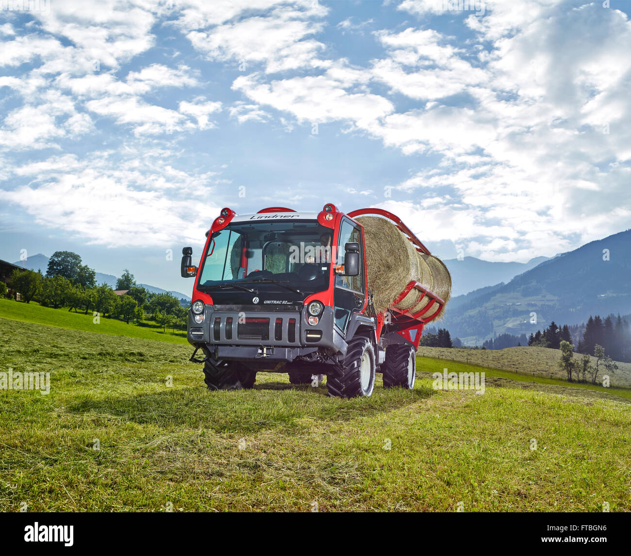 Unitrac transporter with forage trailer and a hay bale, Hopfgarten ...