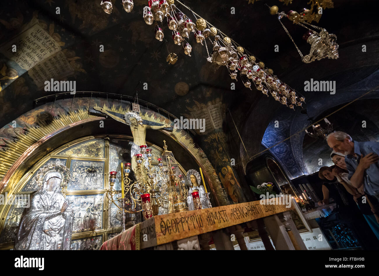 The altar at the traditional site of Golgotha in Holy Sepulchre Church ...