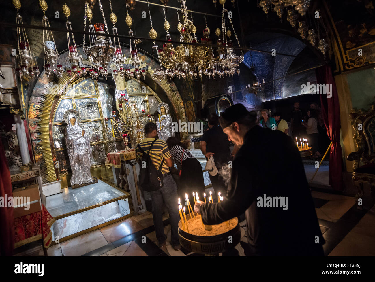 The altar at the traditional site of Golgotha in Holy Sepulchre Church ...