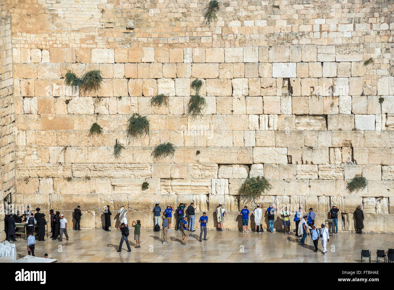 People praying at Western Wall (also called Kotel or Wailing Wall) in ...