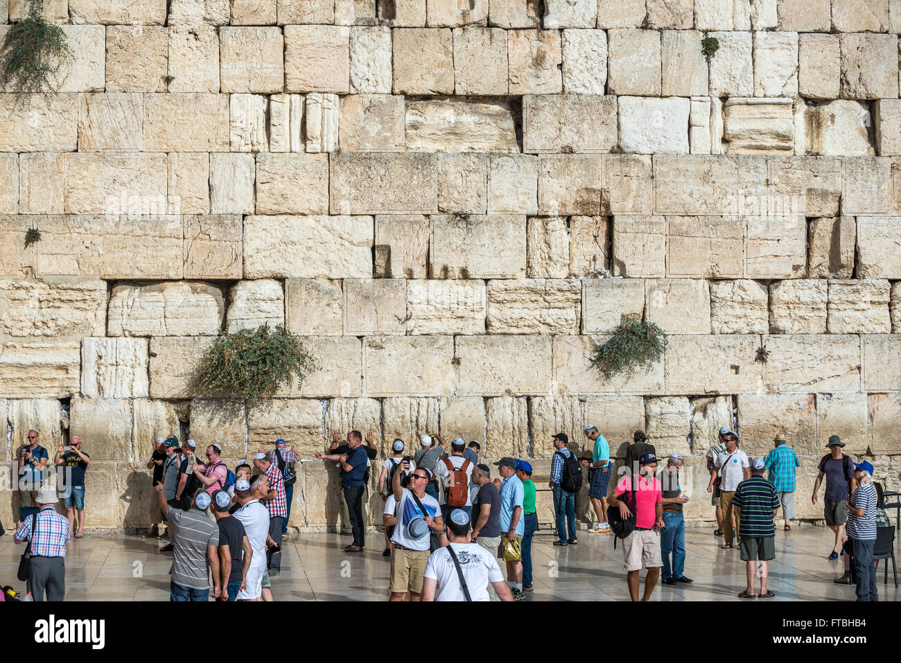 People praying at Western Wall (also called Kotel or Wailing Wall) in ...