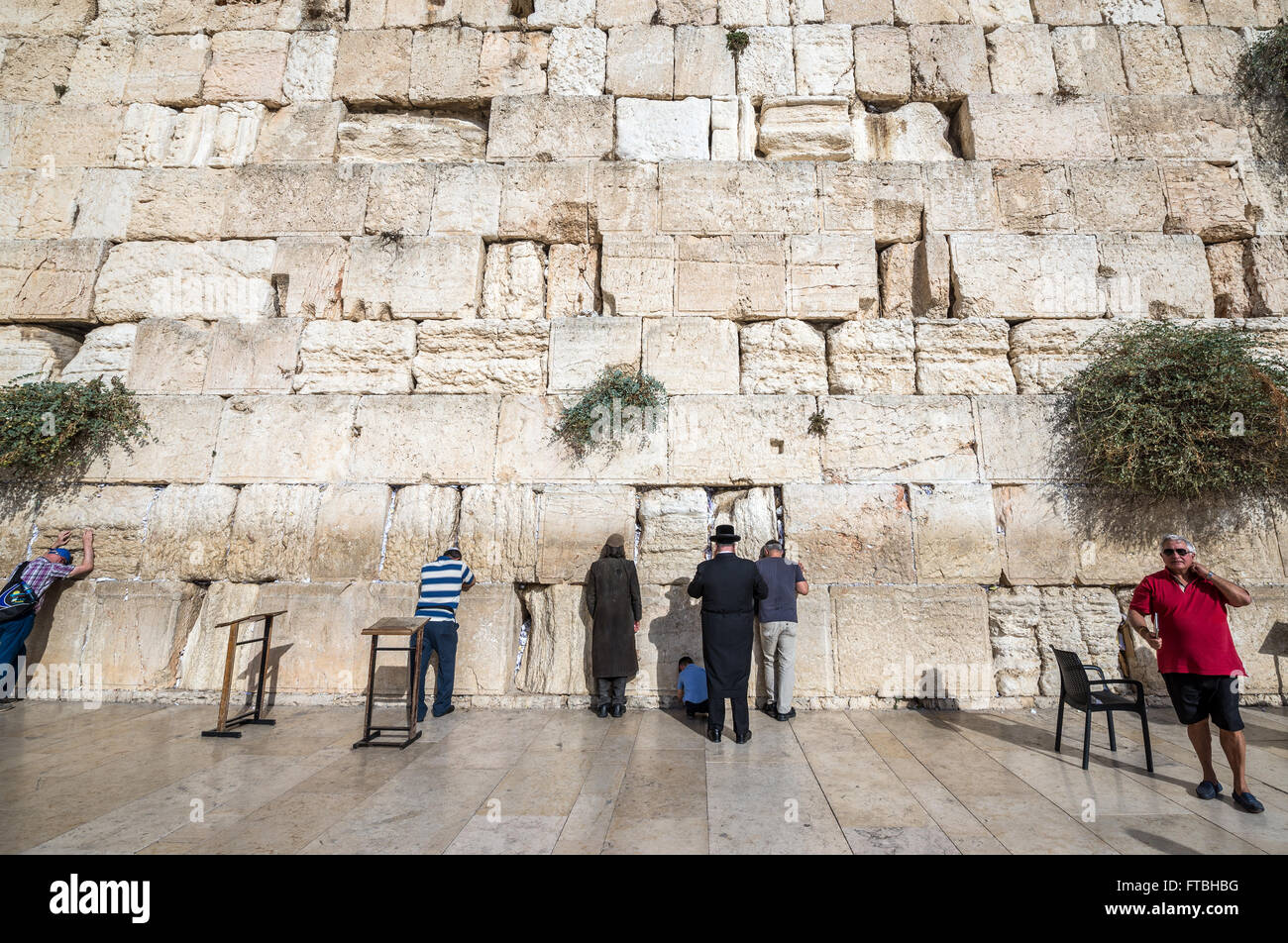 People praying at Western Wall (also called Kotel or Wailing Wall) in ...