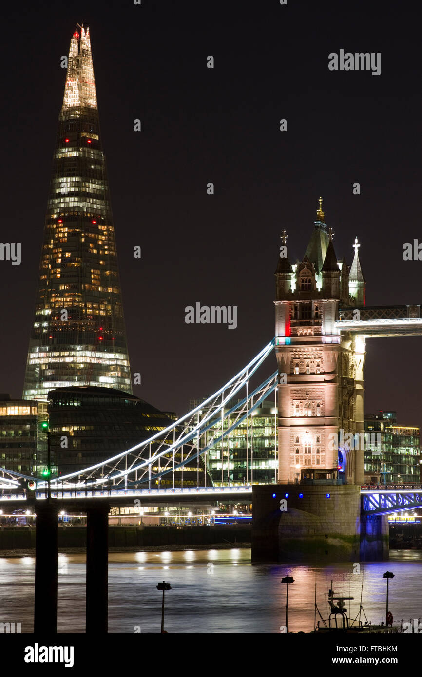 The Shard and Tower Bridge at night as seen from St. Katharine's Way ...
