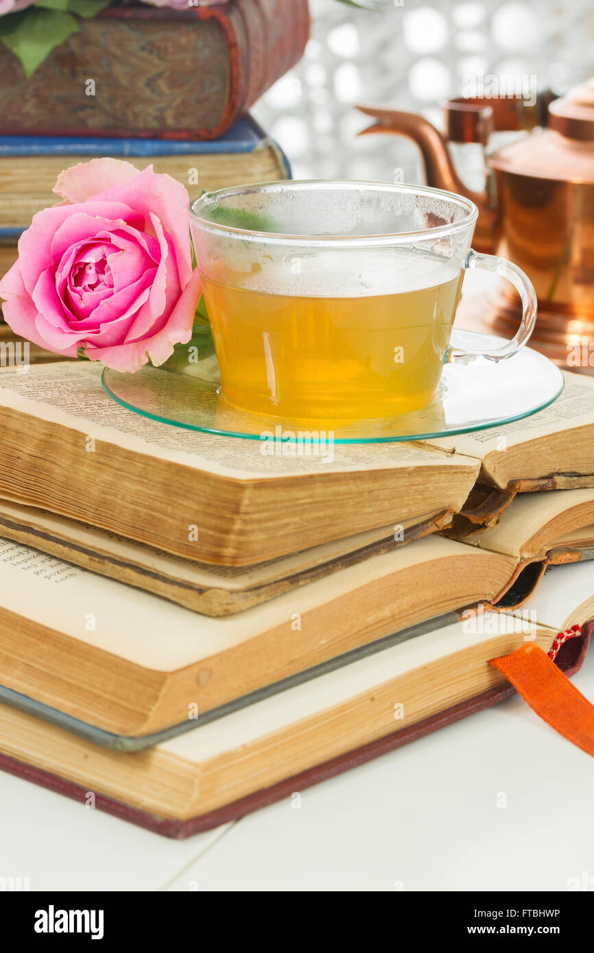 Pile book table teacup hi-res stock photography and images - Alamy