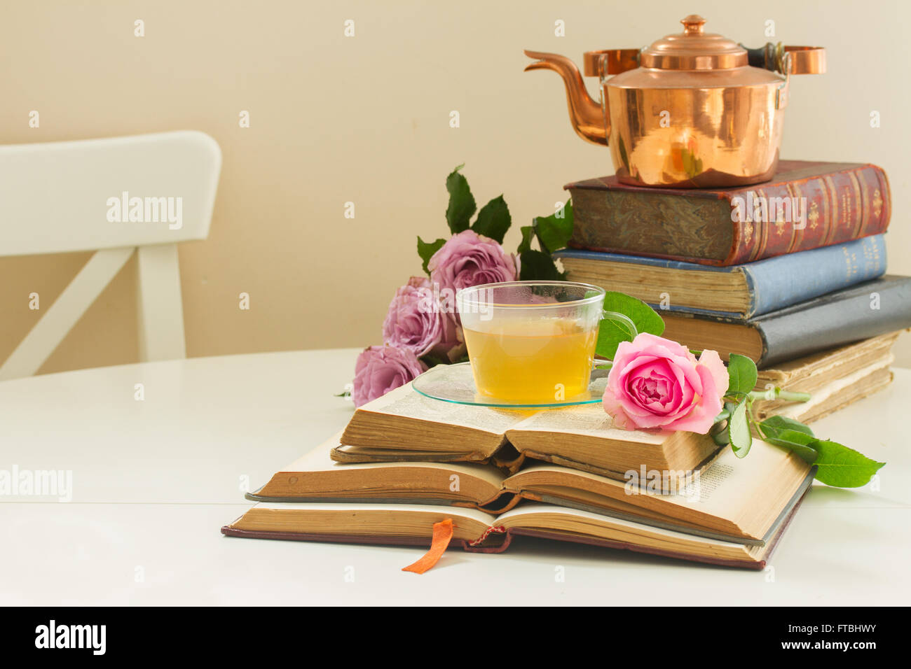 Cup of tea with books Stock Photo - Alamy