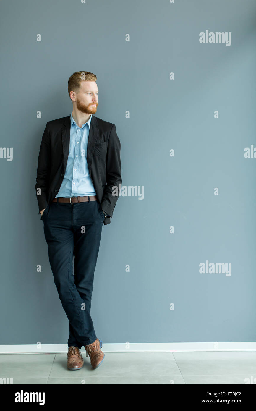 View of the businessman posing in the office Stock Photo - Alamy