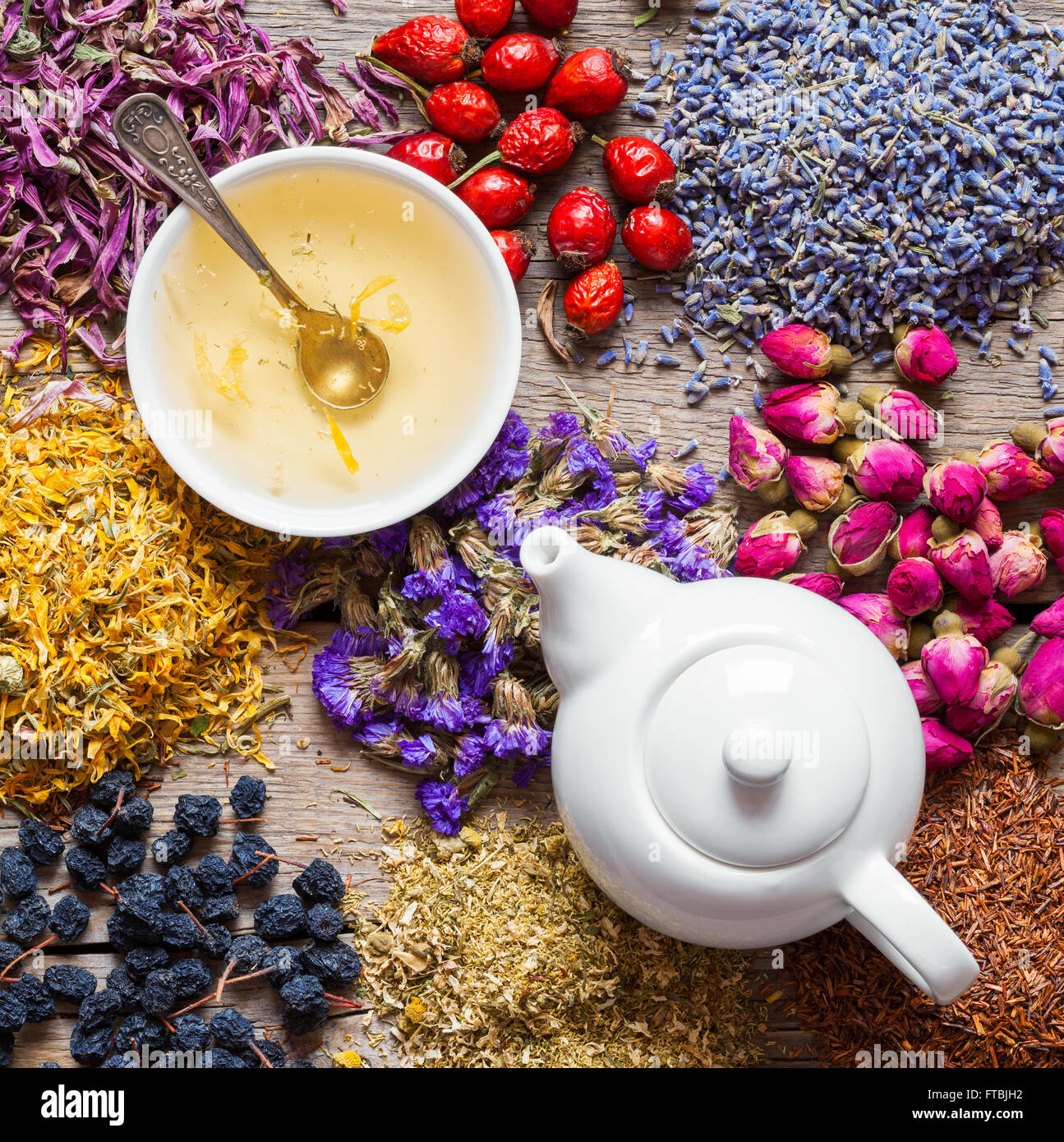 Tea kettle of healthy tea, tea cup, healing herbs, herbal tea ...