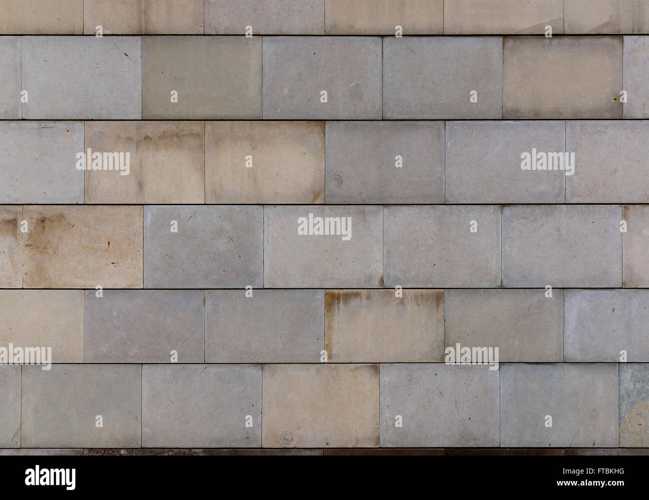 Texture of a wall made of pretty large square cut scratched building ...