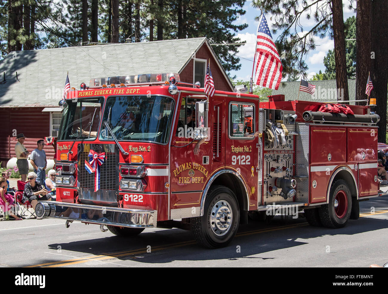 Fireman from the Plumas Eureka fire district drive a fire engine in a ...