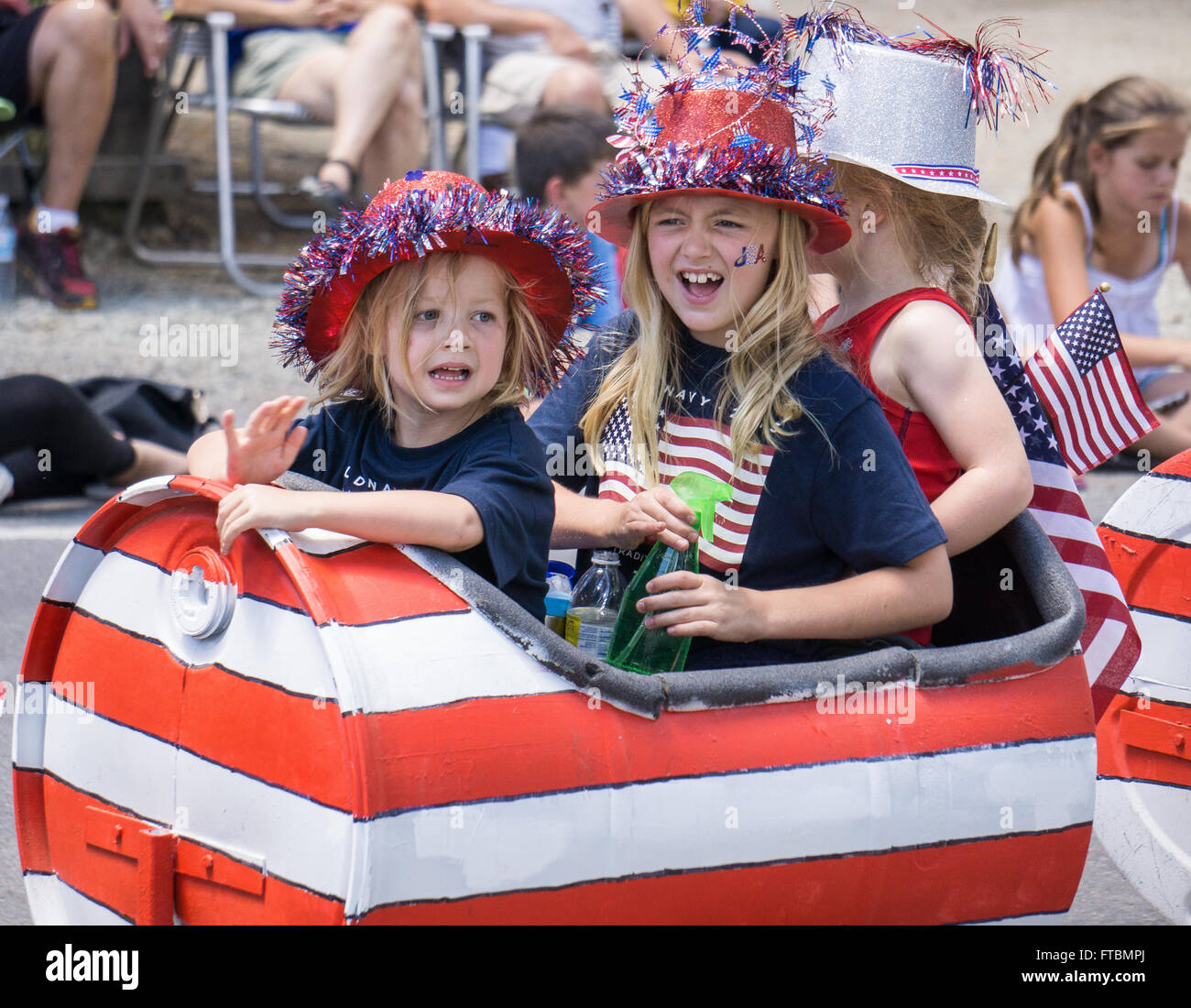 Three girls in a modified barrel ride in the Mohawk Valley Independence ...