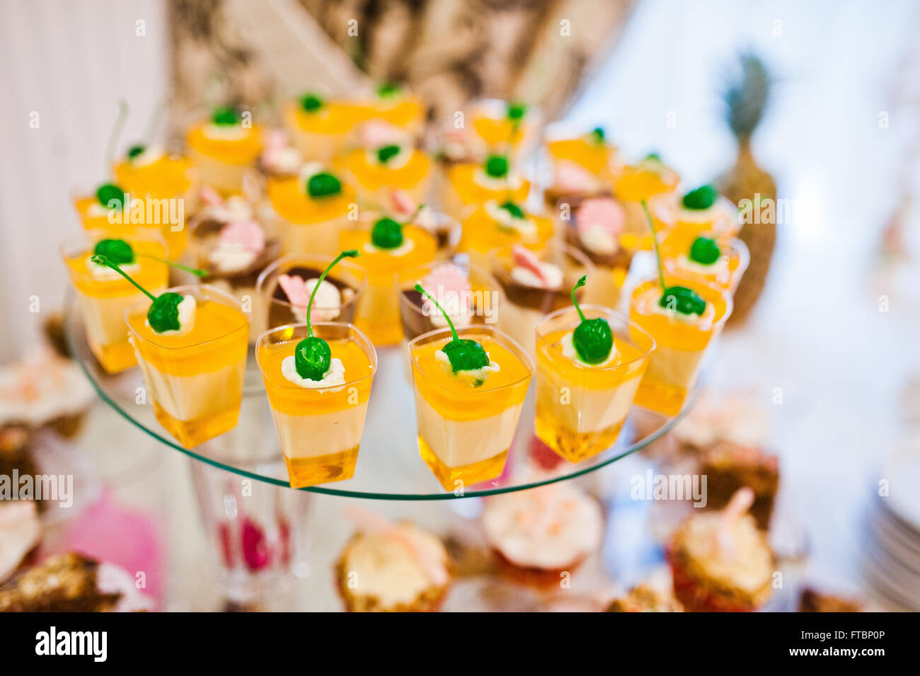 Wedding reception, table of cakes and sweet Stock Photo - Alamy